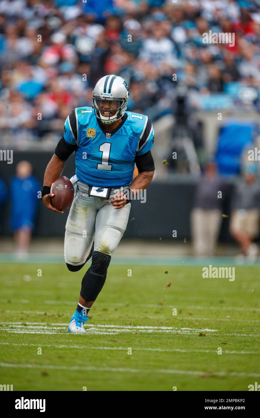 Carolina Panthers quarterback Cam Newton (1) runs the ball against the ...