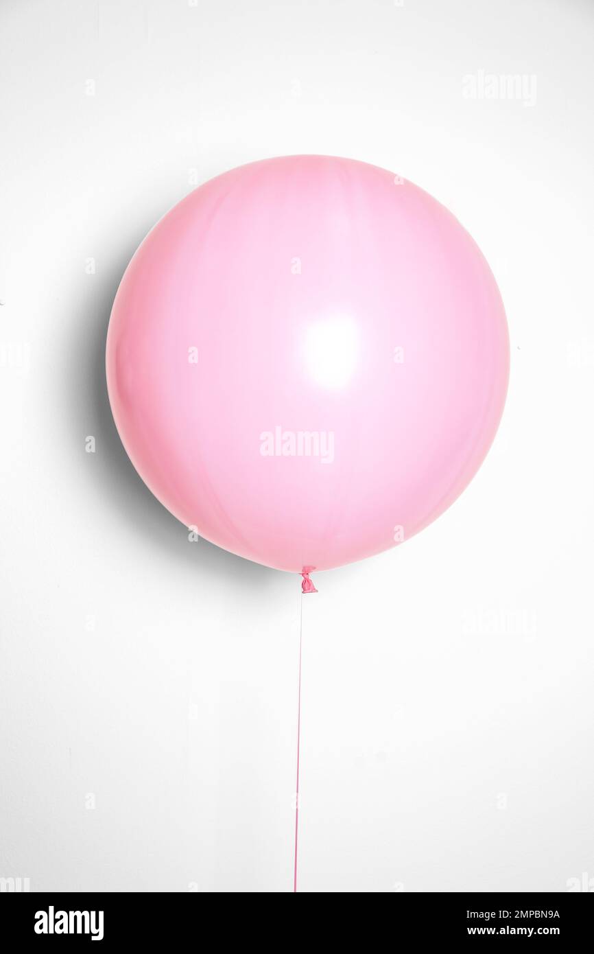 Pink helium balloon hi-res stock photography and images - Alamy