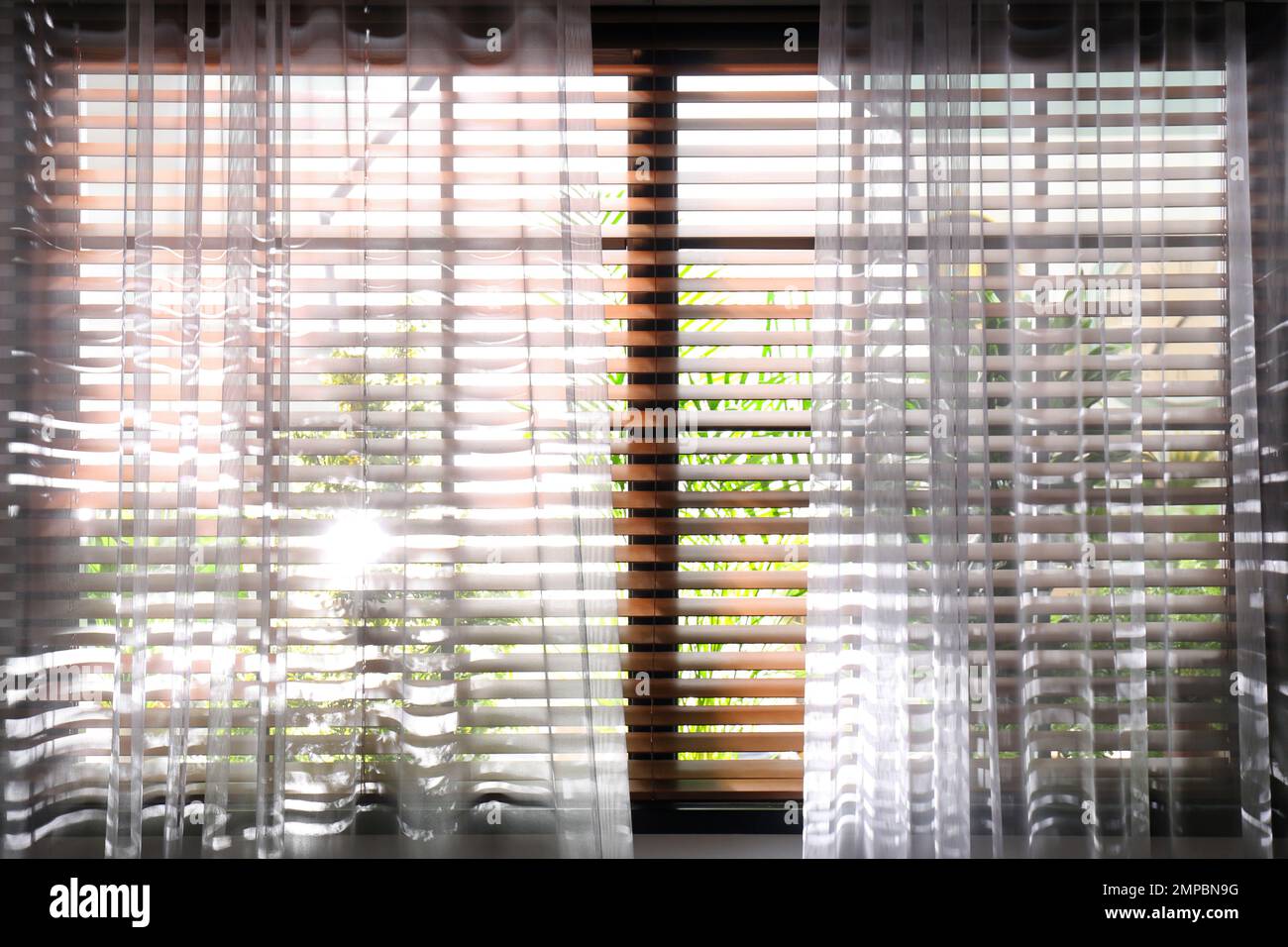 Window with beautiful curtains and blinds, closeup Stock Photo - Alamy