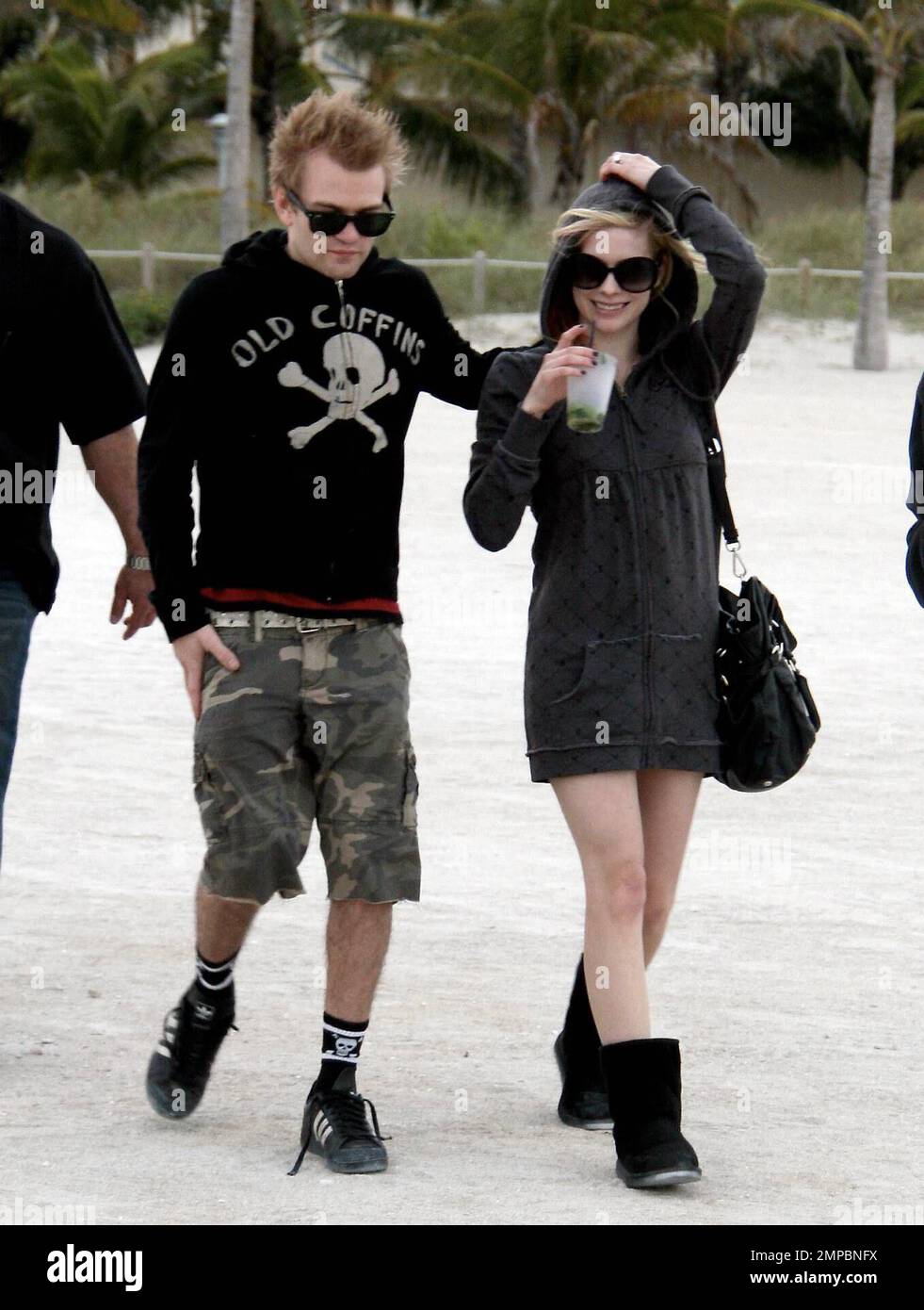 Avril Lavigne and hubby Deryck Whibley get the party started while on ...