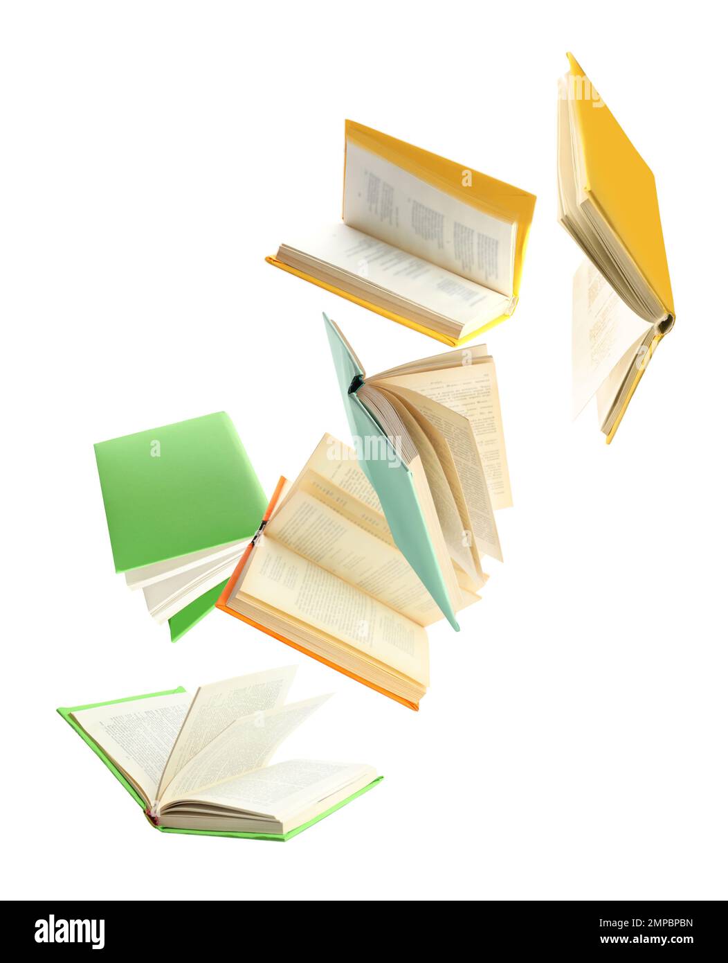 Colorful hardcover books flying on white background Stock Photo - Alamy