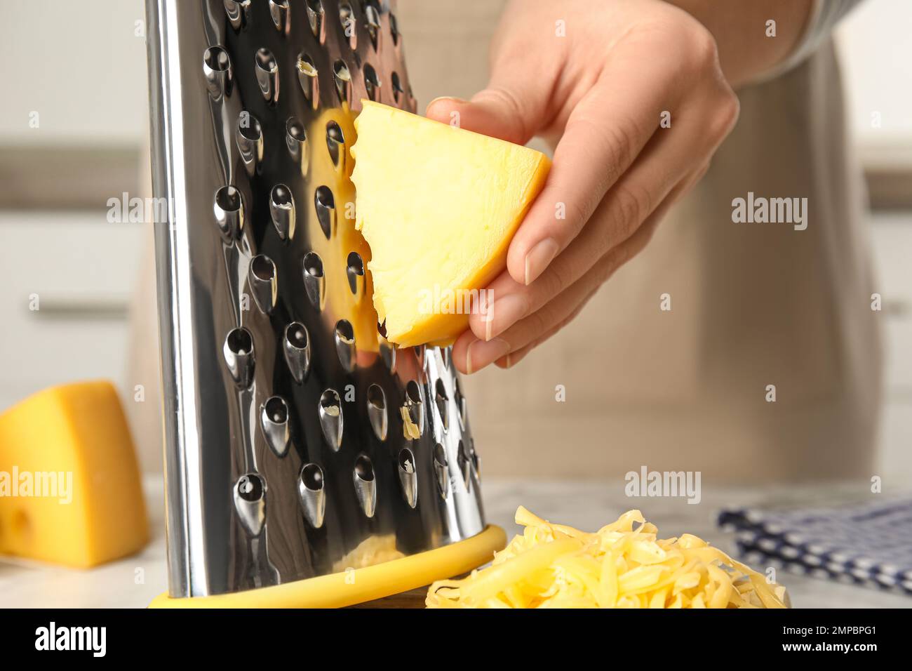 Grating the cheese hi-res stock photography and images - Alamy