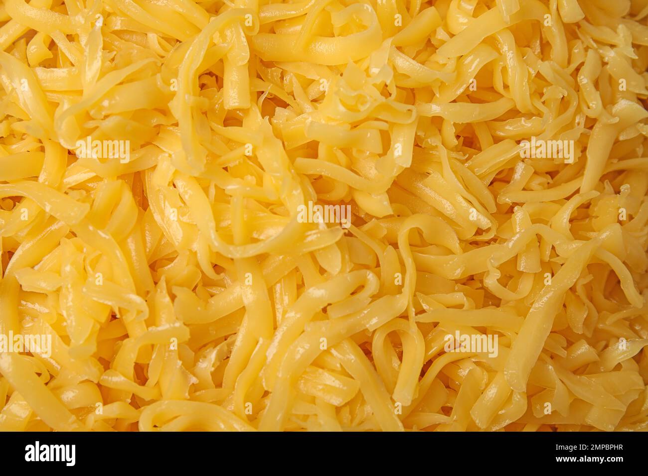 Grated cheese maasdam hi-res stock photography and images - Alamy