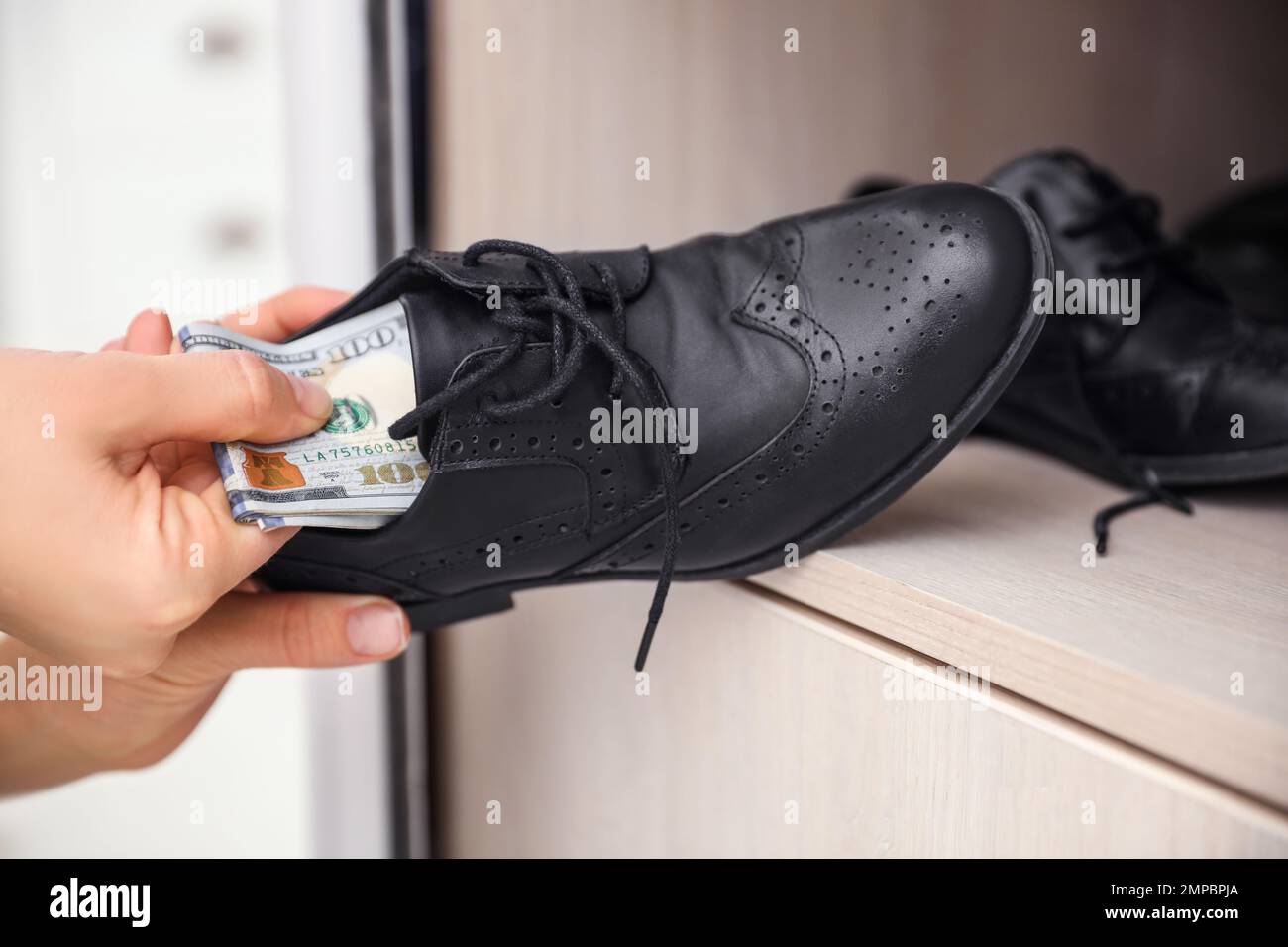 Money greed woman black hi-res stock photography and images - Alamy