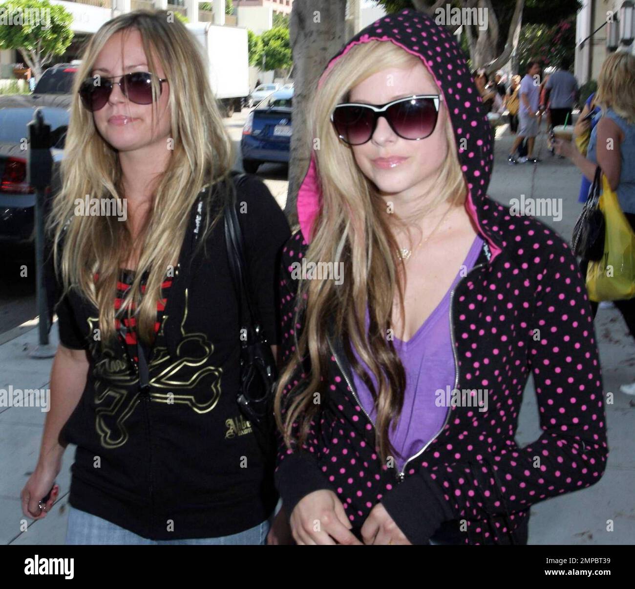 Avril Lavigne and a female friend shop at Chanel in Beverly Hills, Ca ...