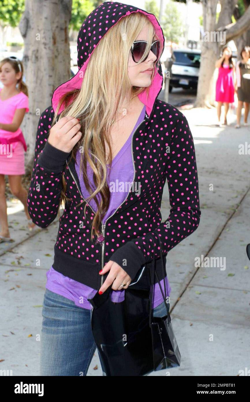 - Avril Lavigne and a female friend shop at Chanel in Beverly Hills, Ca ...