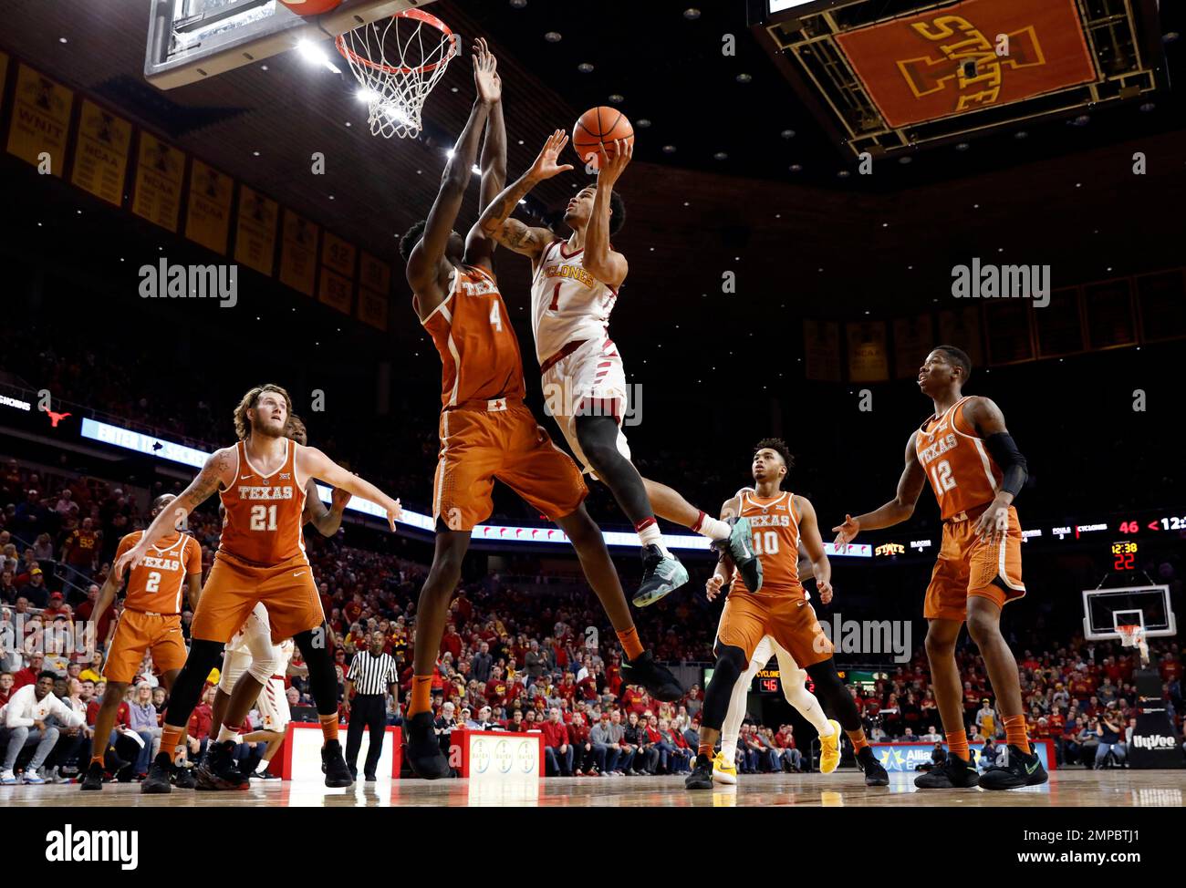 Iowa State guard Nick Weiler-Babb (1) drives to the basket over Texas ...