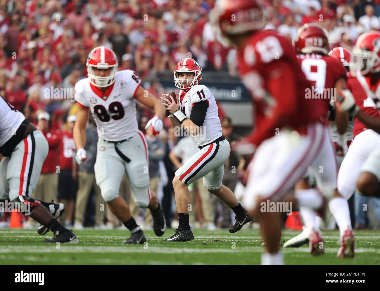 Georgia quarterback Jake Fromm (11) drops back to throw a pass against ...