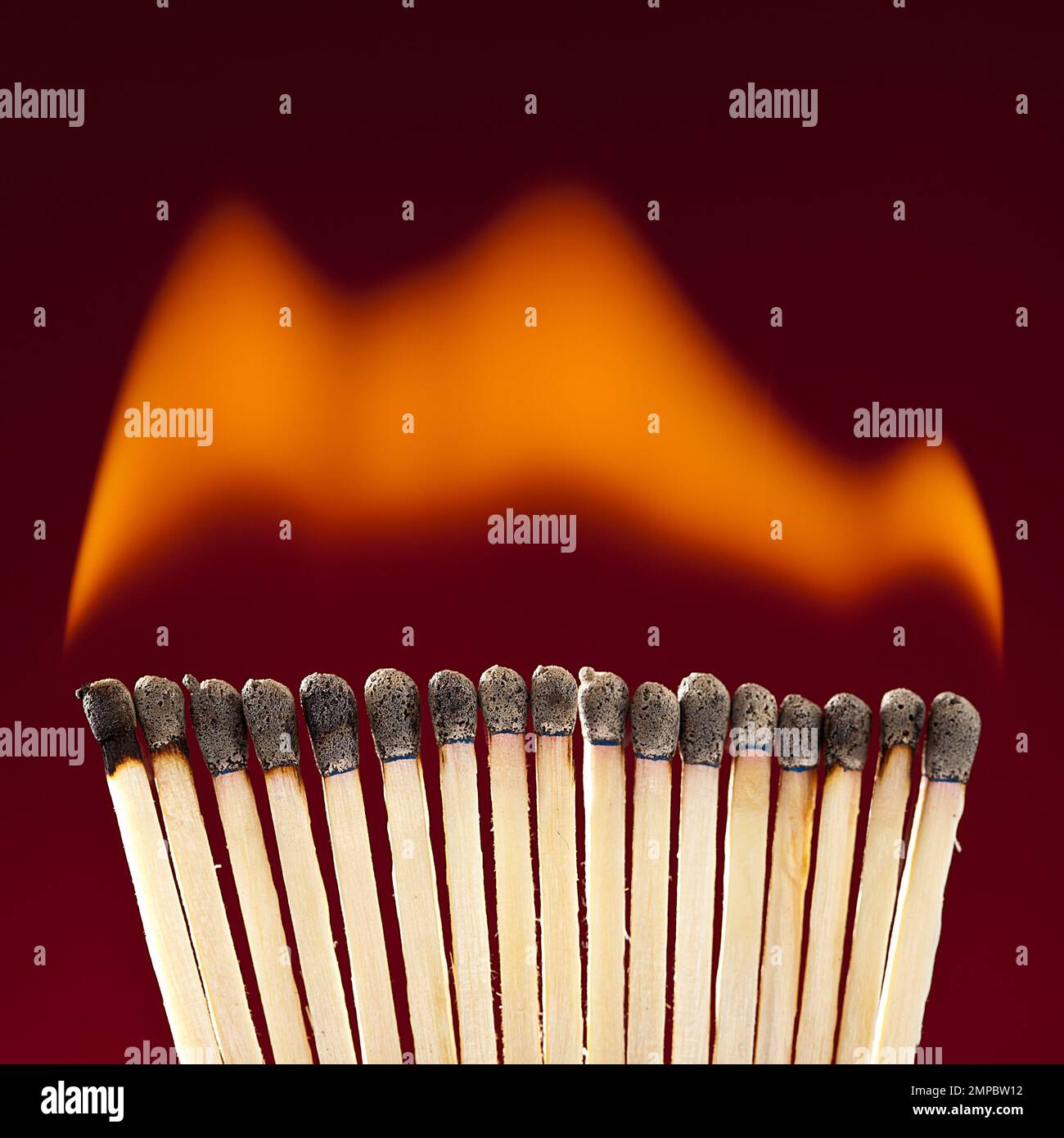Line of burning matches Stock Photo - Alamy