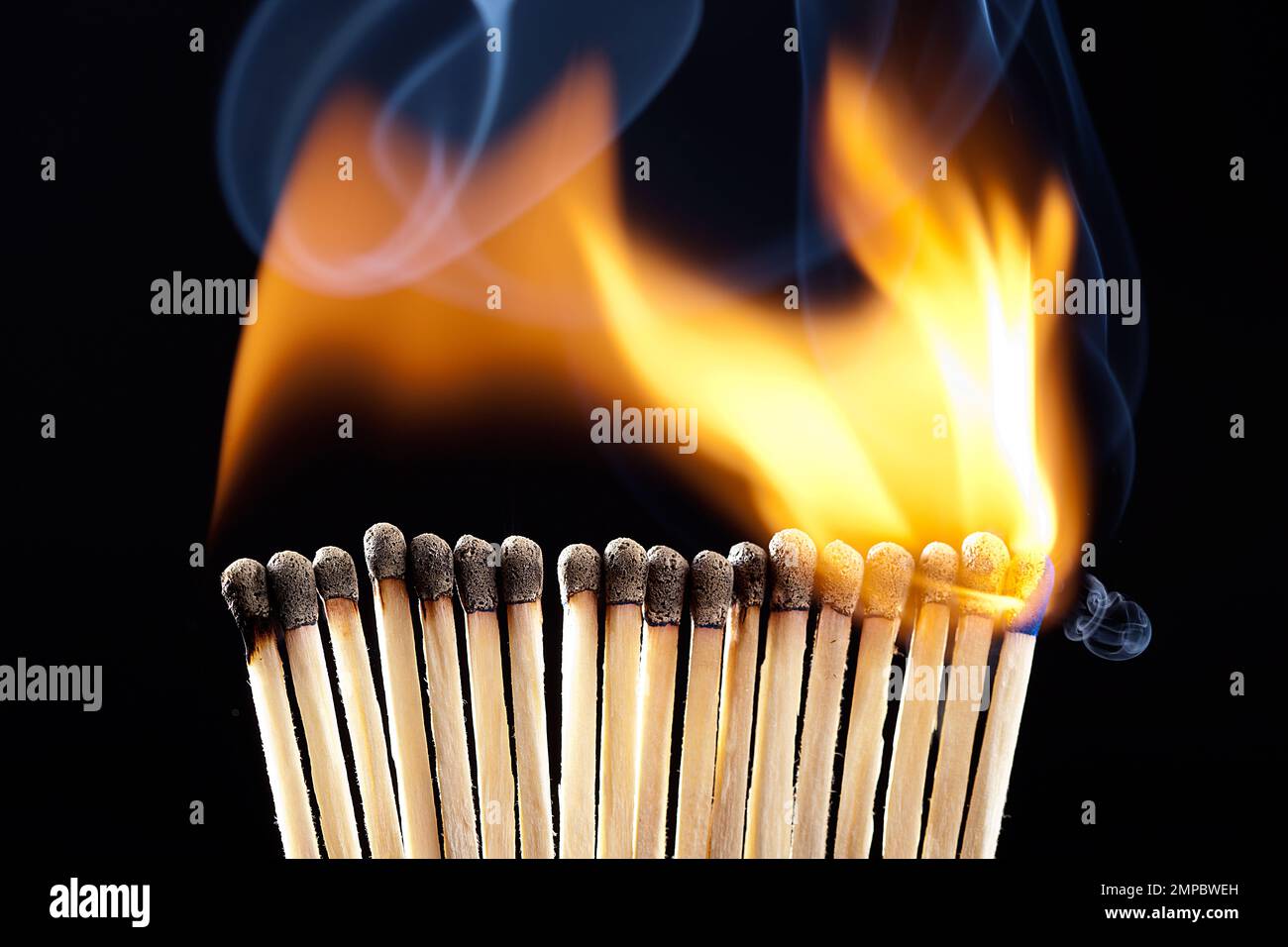 Line of burning matches Stock Photo - Alamy