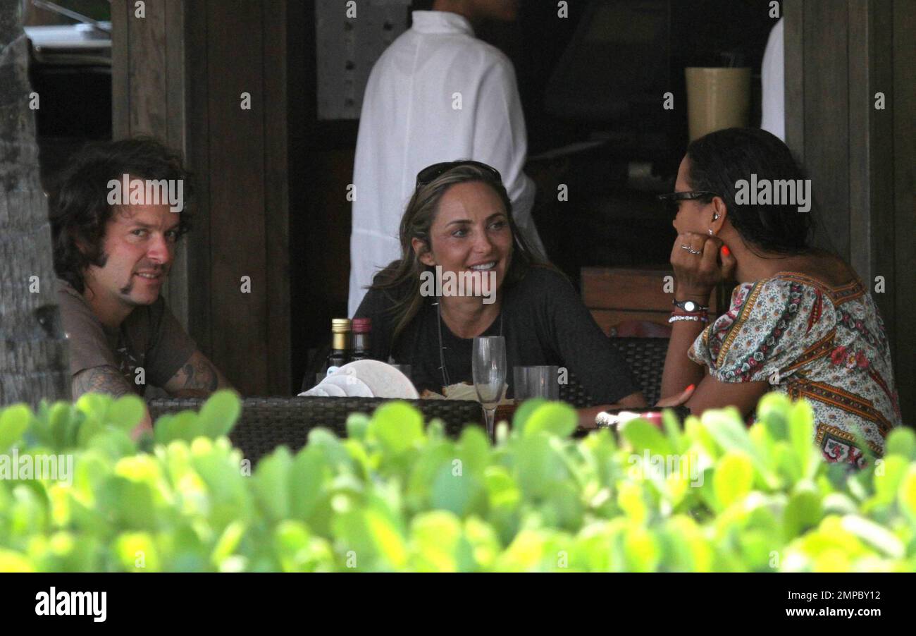 Barbara Feltus and Arne Quinze enjoy an ocean-front lunch at a luxury ...