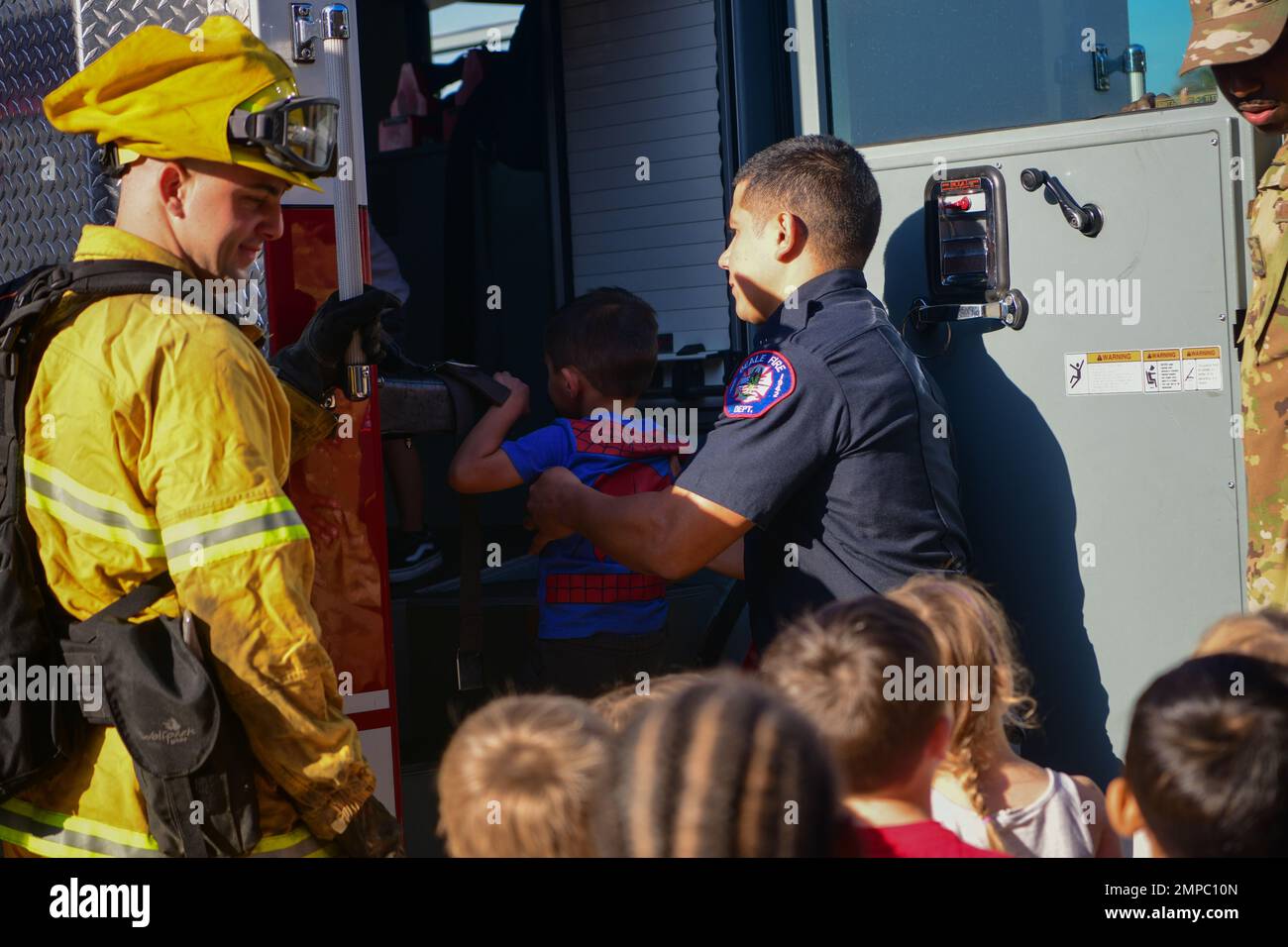 Firefighters from the Beale Fire Department give a demonstration to ...