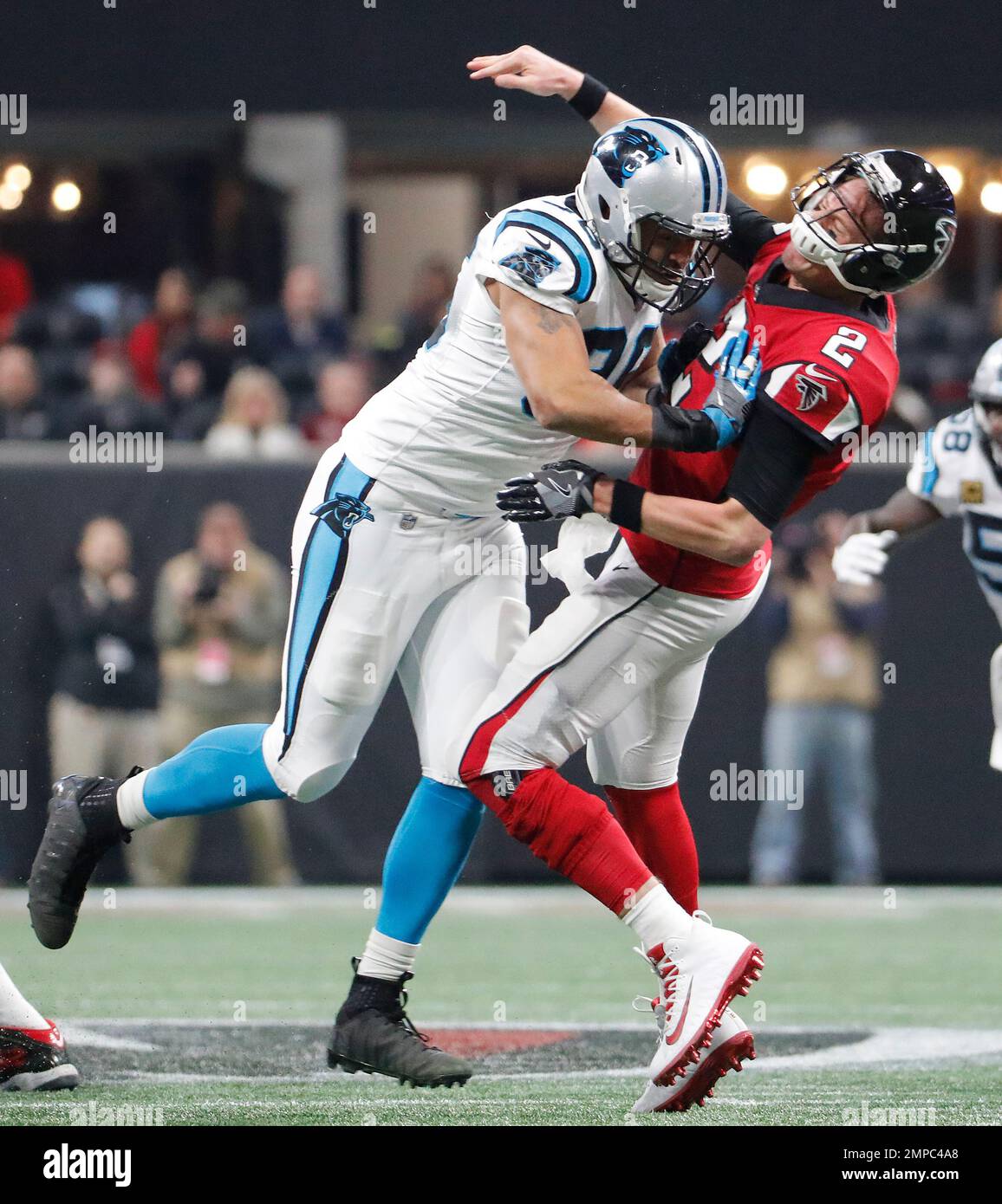 Carolina Panthers defensive end Julius Peppers (90) hits Atlanta ...