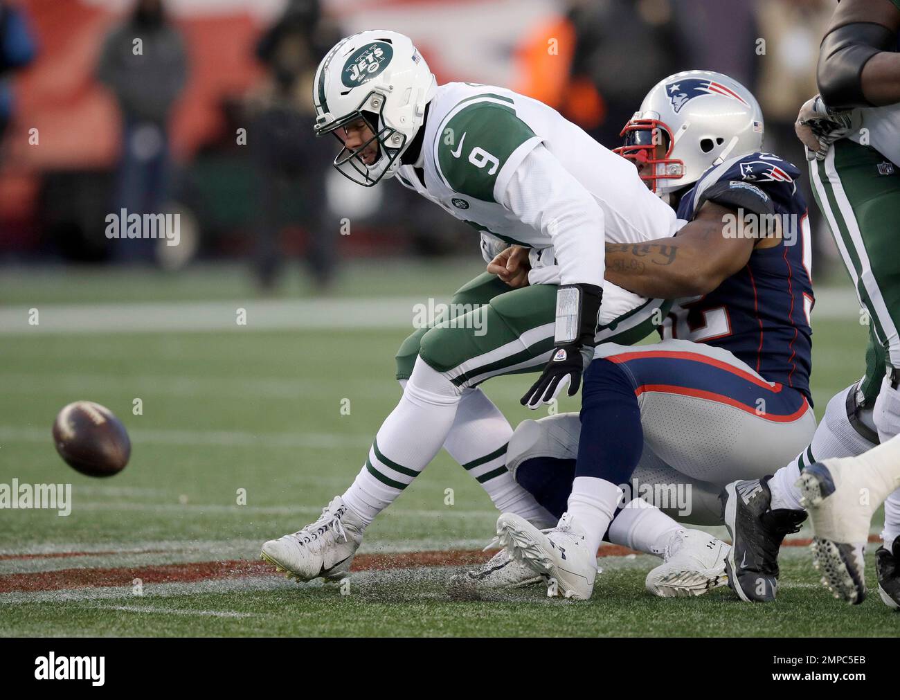 New England Patriots linebacker James Harrison, right, sacks New York ...