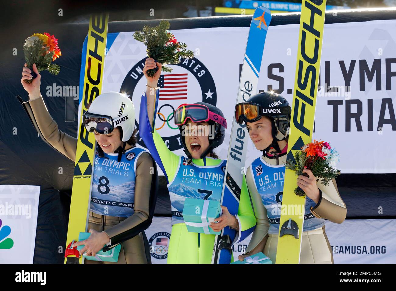 First place finisher Sarah Hendrickson, center, shares the podium with second place finisher ...