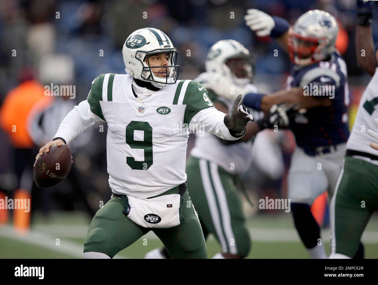 New York Jets quarterback Bryce Petty (9) scrambles under pressure from ...