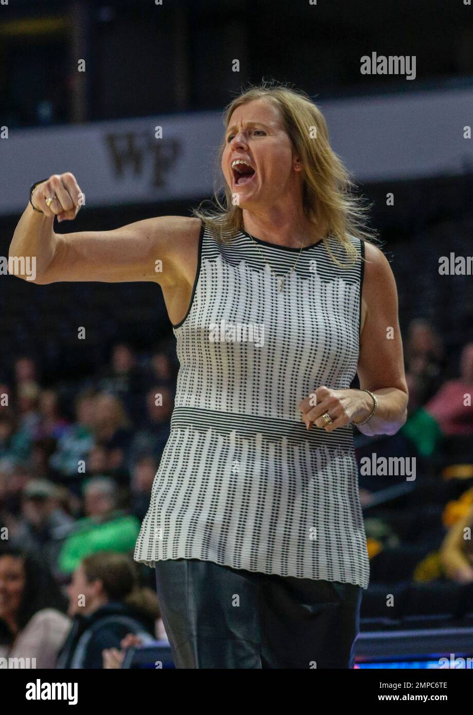 Wake Forest coach Jen Hoover encourages her team in the first half of ...