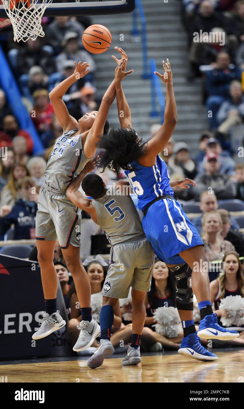 Connecticut's Napheesa Collier (24) and Crystal Dangerfield (5) battle ...
