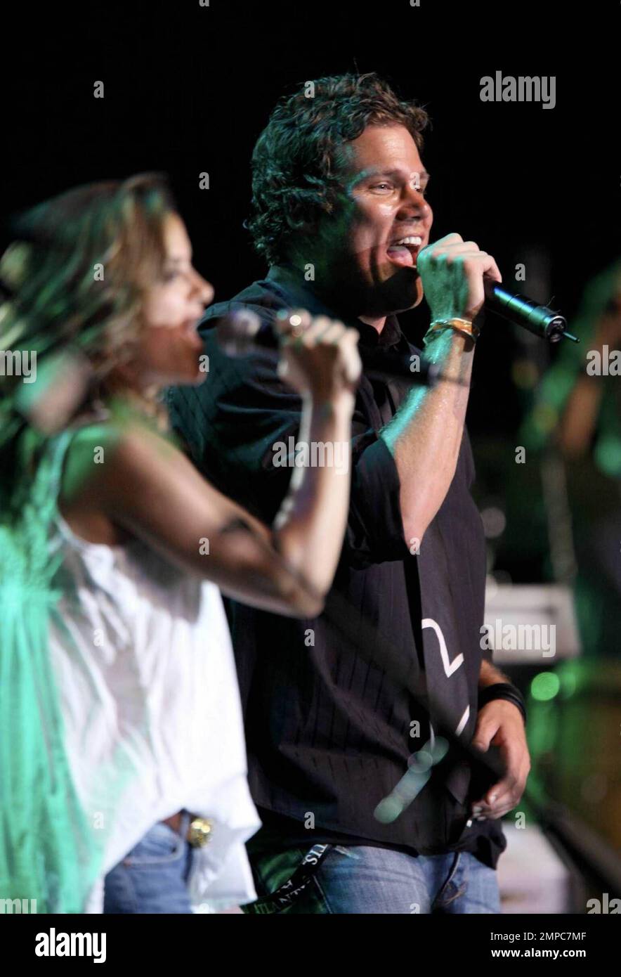 Bob Guiney performs in the Band from TV concert at Atlantis on Paradise ...