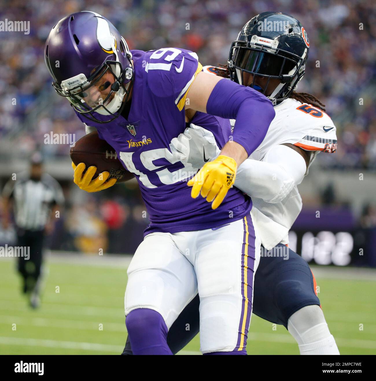 Minnesota Vikings wide receiver Adam Thielen breaks a tackle by Chicago ...