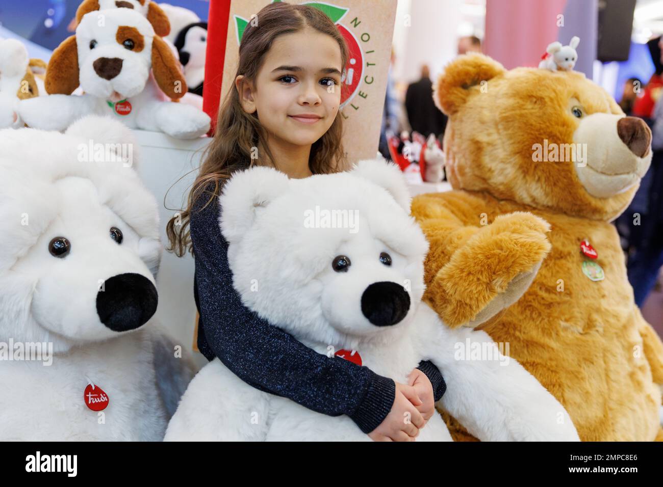 Nuremberg, Germany. 31st Jan, 2023. Fleur sits among large plush bears ...