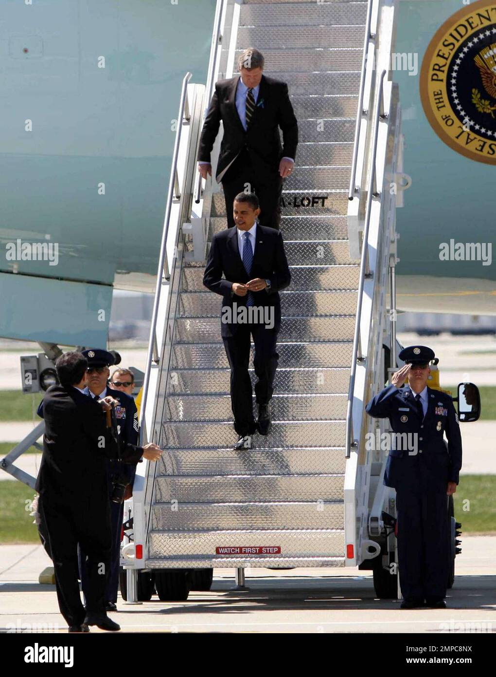 US President Barack Obama arrives on Air Force One in Des Moines, Iowa to tour the Trinity ...