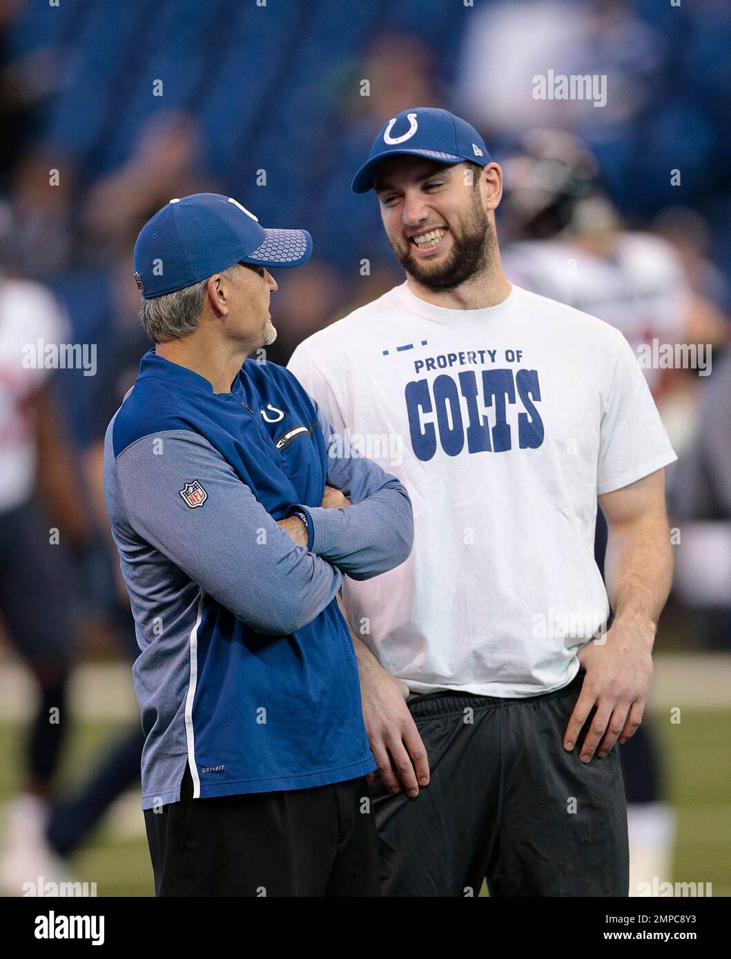 Indianapolis Colts head coach Chuck Pagano talks with Andrew Luck ...