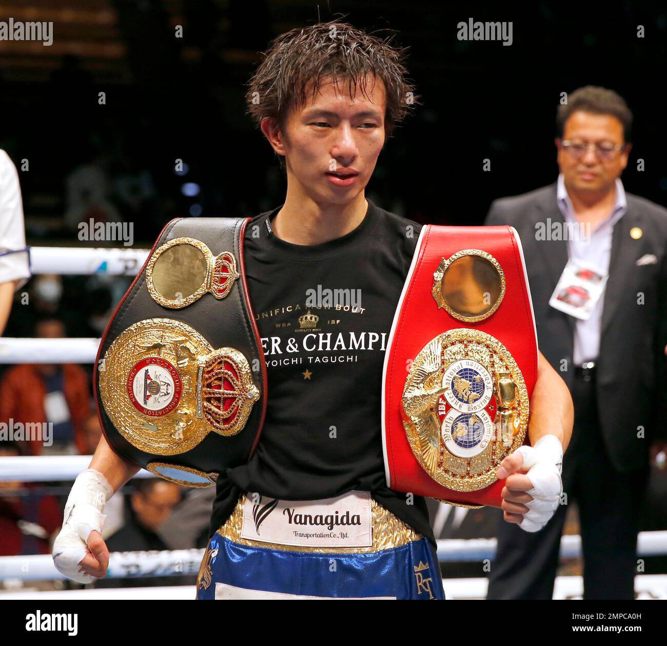 Ryoichi Taguchi of Japan poses with WBA and IBF world light flyweight ...