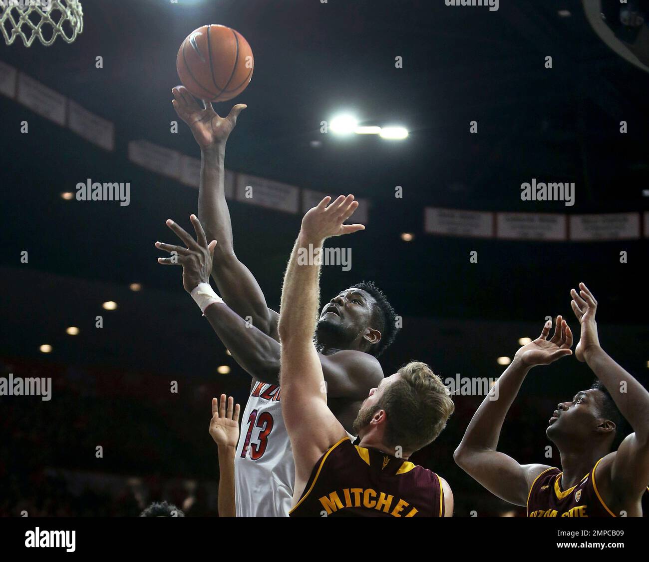 Arizona forward Deandre Ayton (13) shoots over Arizona State's Mickey ...