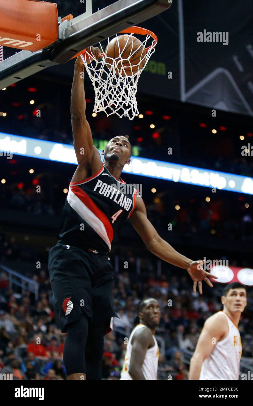 Portland Trail Blazers forward Maurice Harkless (4) dunks in the first ...