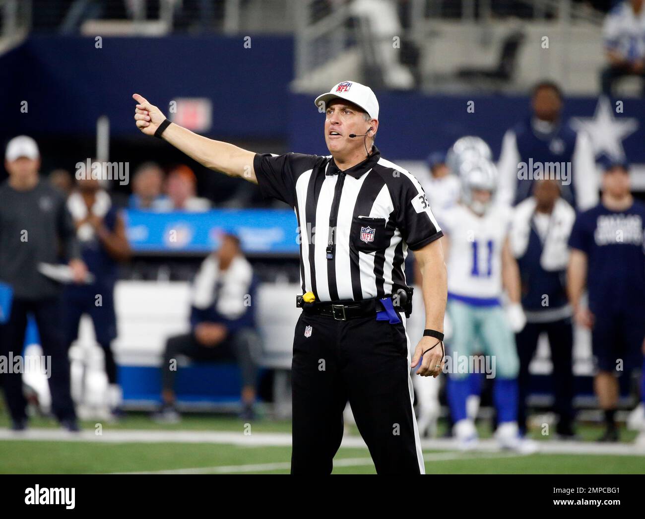Referee John Hussey (35) makes a call during an NFL football game ...