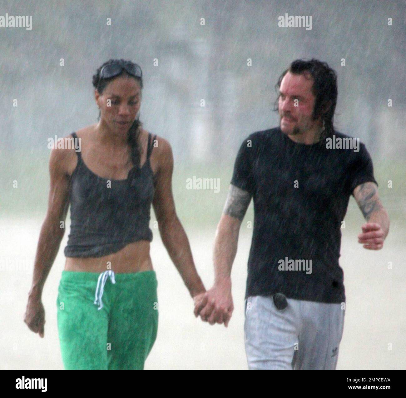 Exclusive!! Barbara Becker ends up getting soaked in a storm when she ...