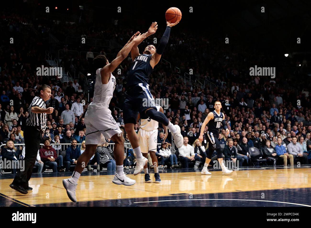 Villanova guard Jalen Brunson (1) shoots in front of Butler guard Aaron ...