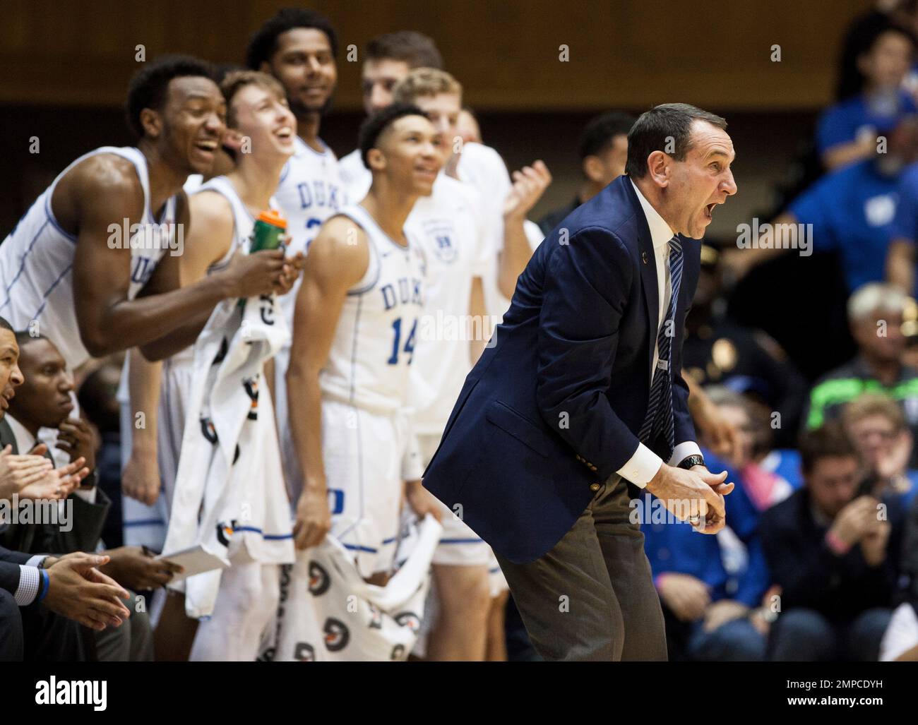 Duke Head Coach Mike Krzyzewski, right, shouts toward the court as the ...