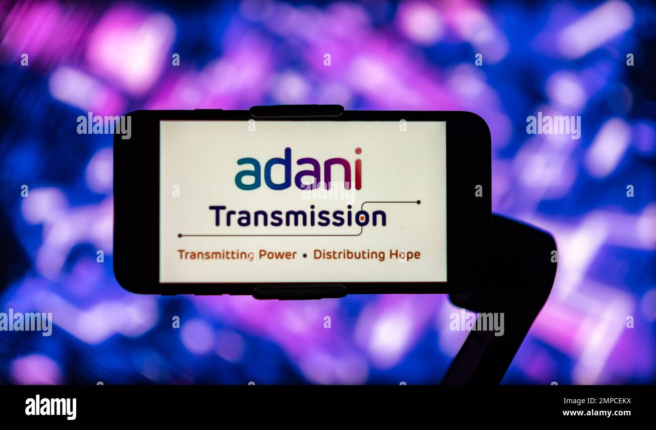 In this photo illustration, the logo of Adani Transmission seen ...