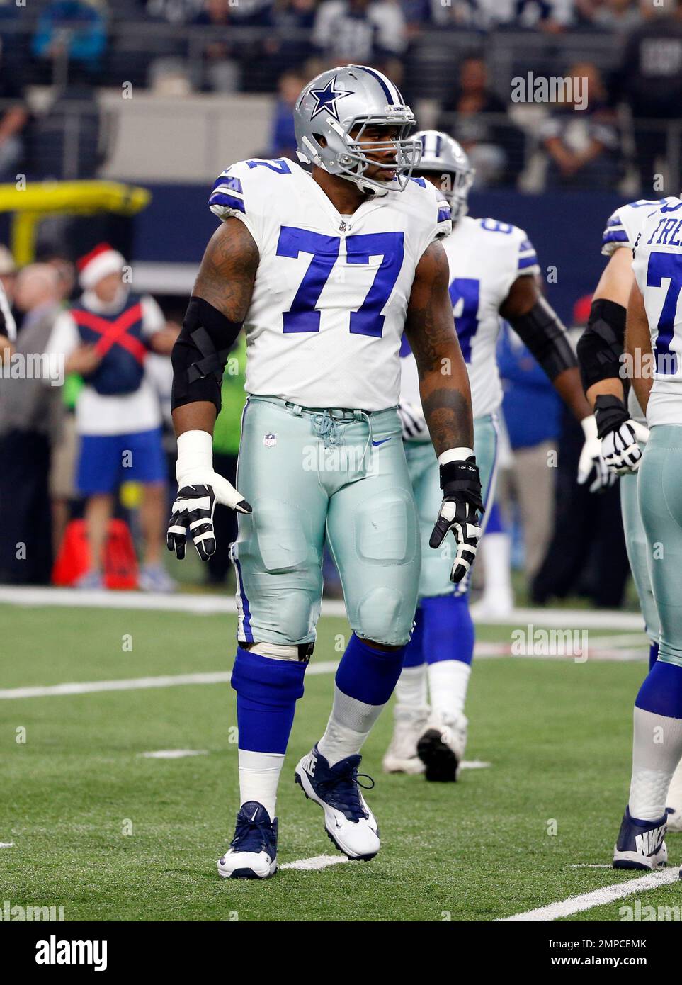 Dallas Cowboys offensive tackle Tyron Smith (77) prepares for a play ...