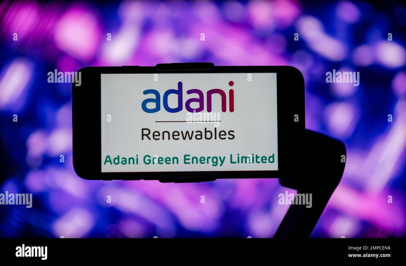 In this photo illustration, the logo of Adani Renewables seen displayed ...