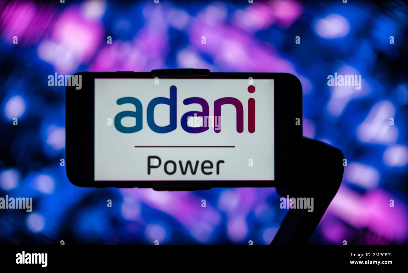 In this photo illustration, the logo of Adani Power seen displayed on a ...