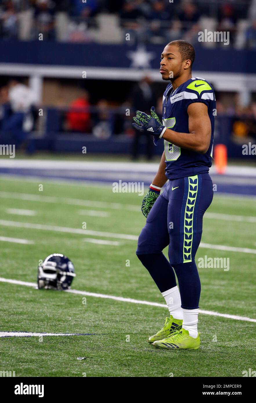 Seattle Seahawks wide receiver Tyler Lockett (16) walks not he field ...