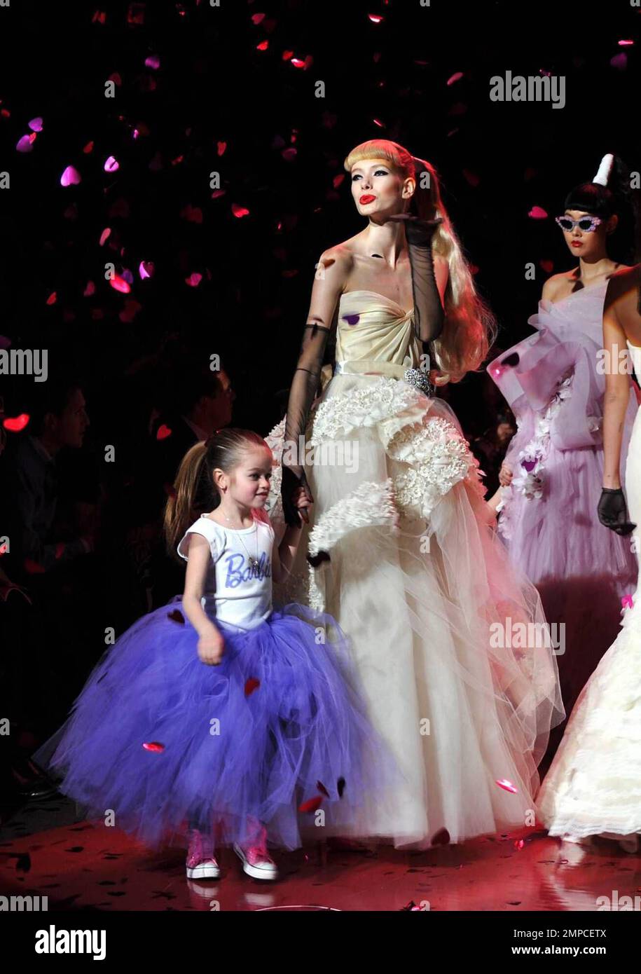 Models walk the runway during the Barbie 50th Anniversary fashion show ...