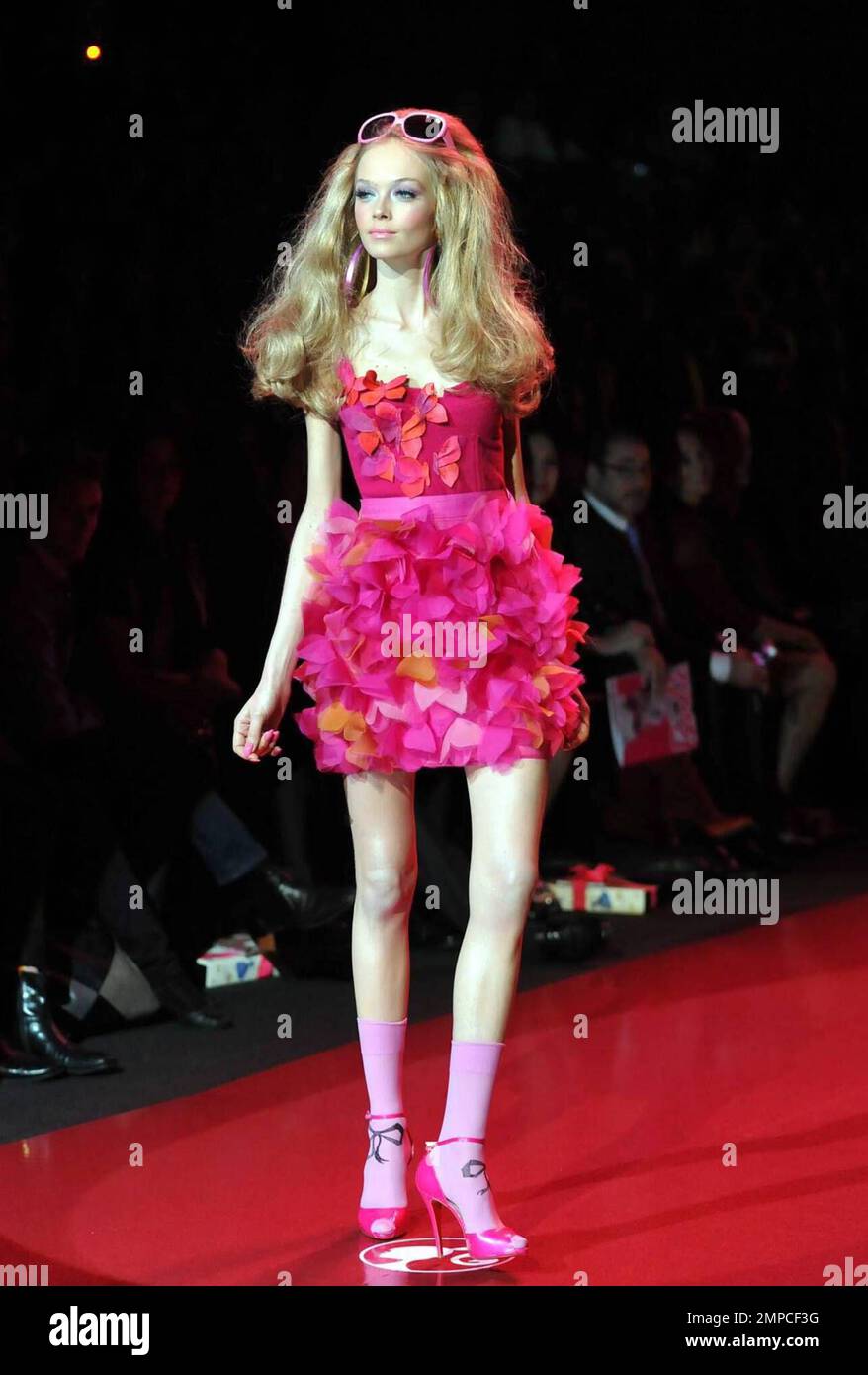 Models walk the runway during the Barbie 50th Anniversary fashion show ...