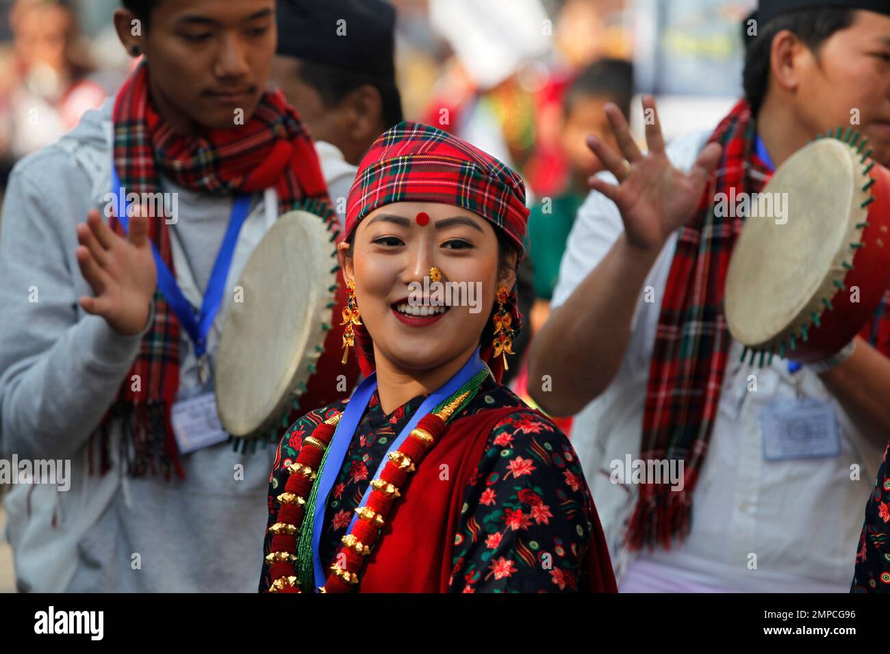 Nepalese Gurung community men and women wear traditional attire as they ...