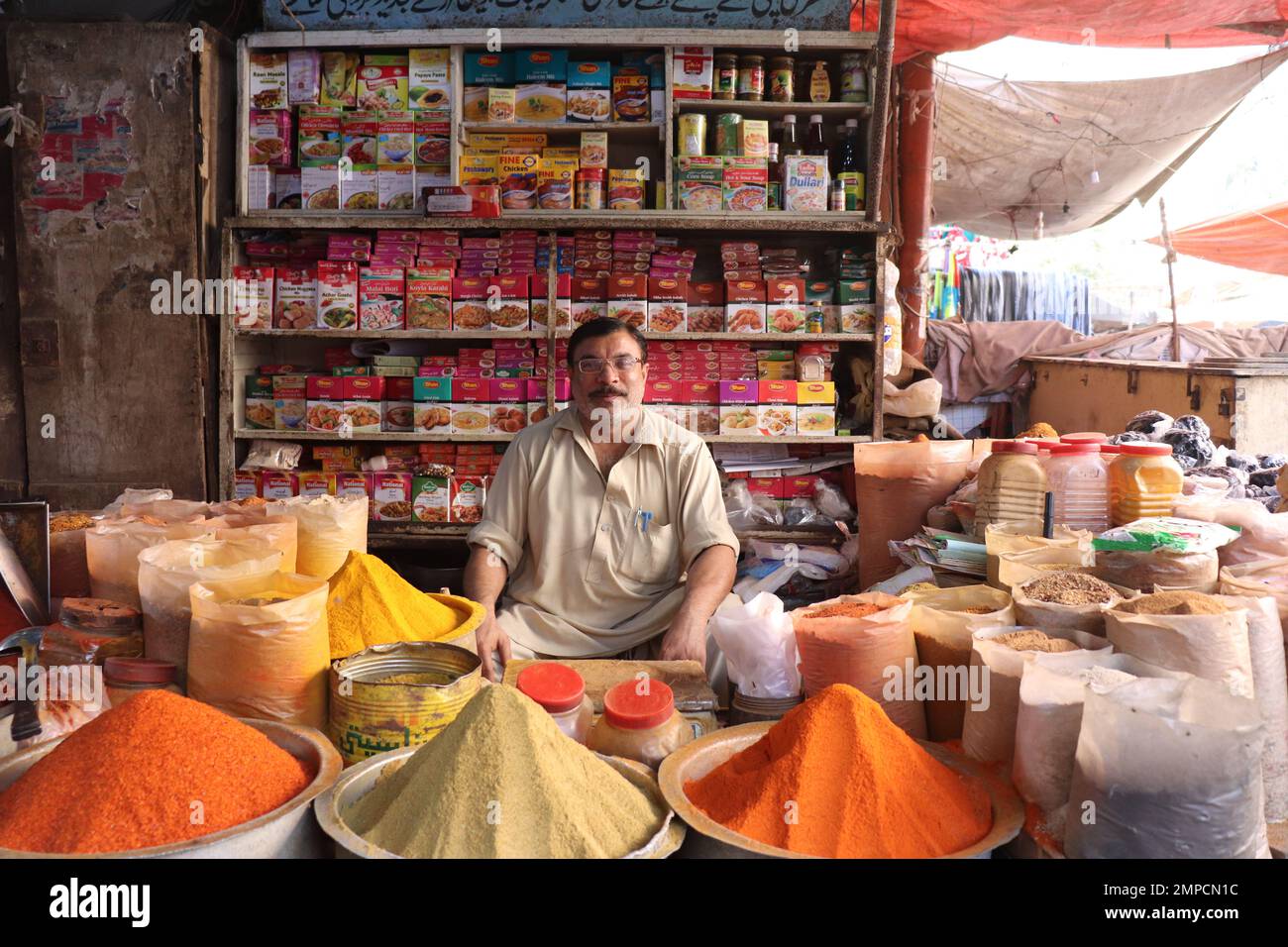 Shopkeeper selling customer hi-res stock photography and images - Alamy
