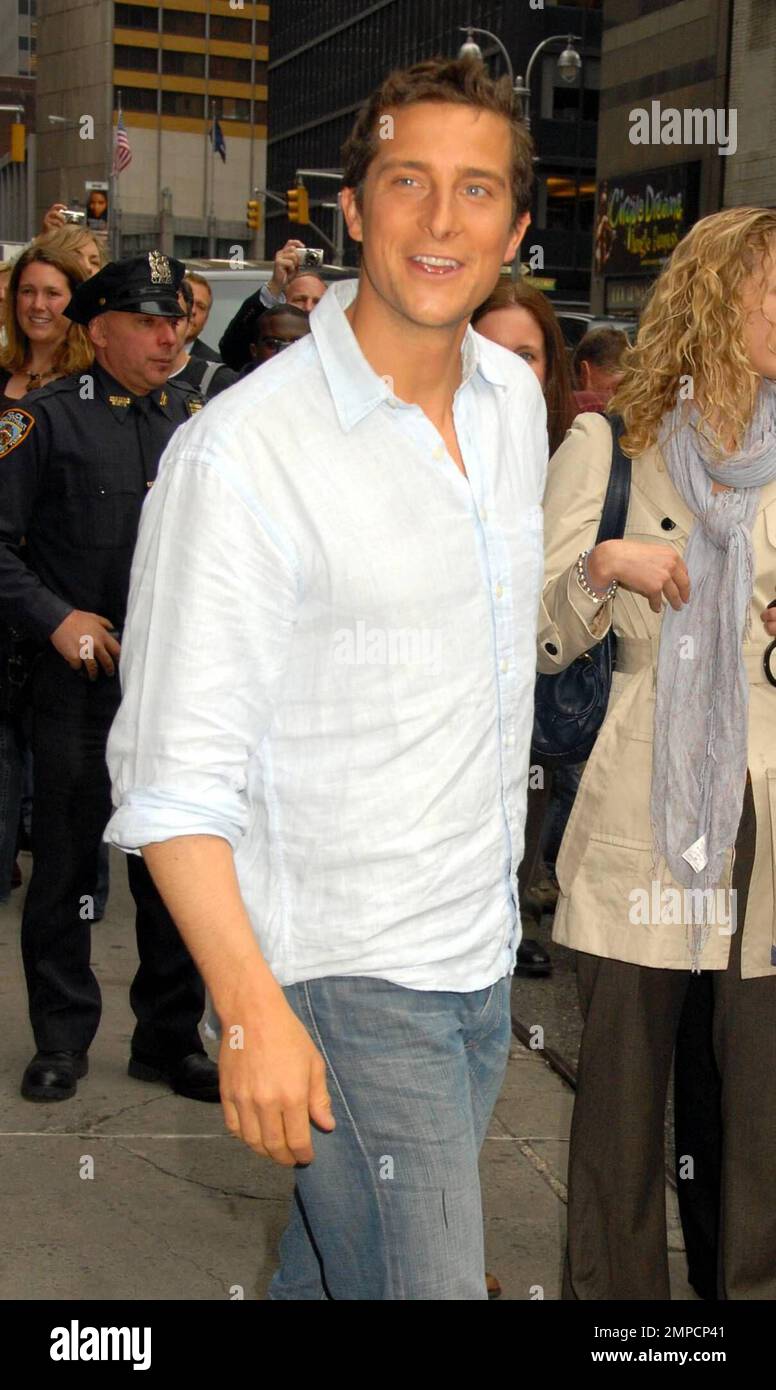 Bear Grylls and singer Robyn pose for photos outside the "Late Show ...