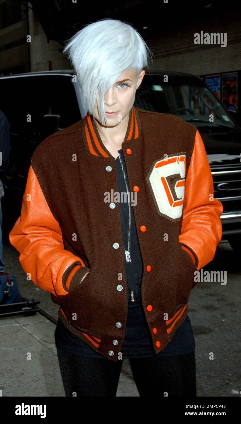 Bear Grylls and singer Robyn pose for photos outside the "Late Show ...