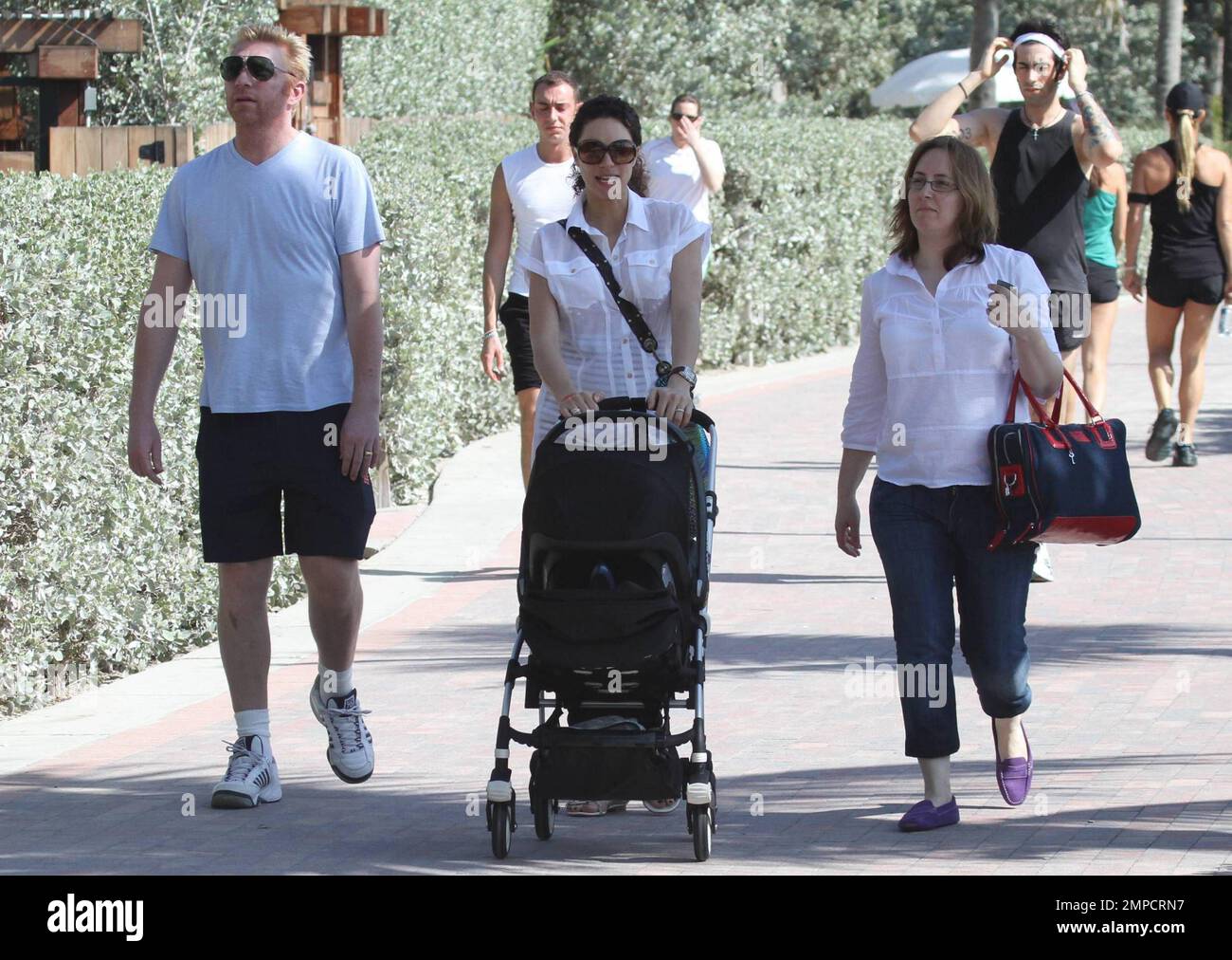 EXCLUSIVE!! Tennis ace Boris Becker walks along Miami Beach boardwalk ...