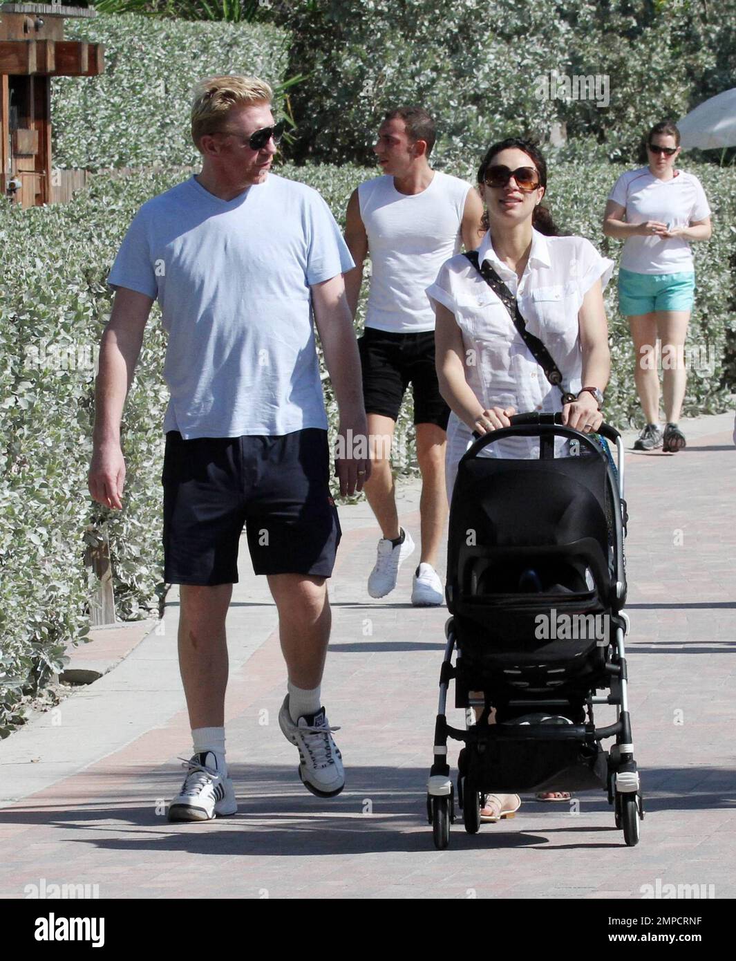 EXCLUSIVE!! Tennis ace Boris Becker walks along Miami Beach boardwalk ...