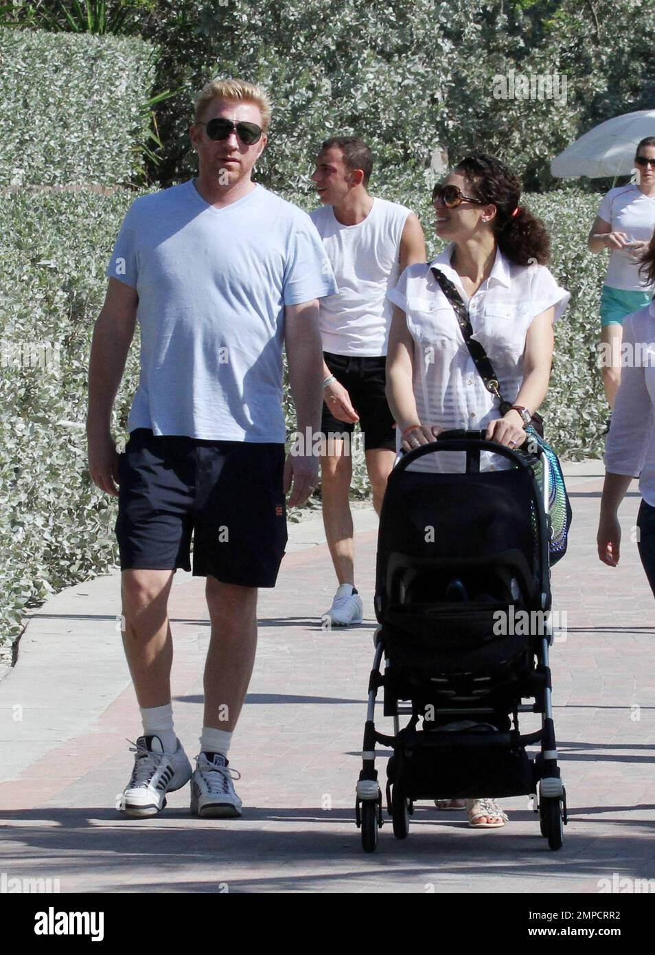 EXCLUSIVE!! Tennis ace Boris Becker walks along Miami Beach boardwalk ...