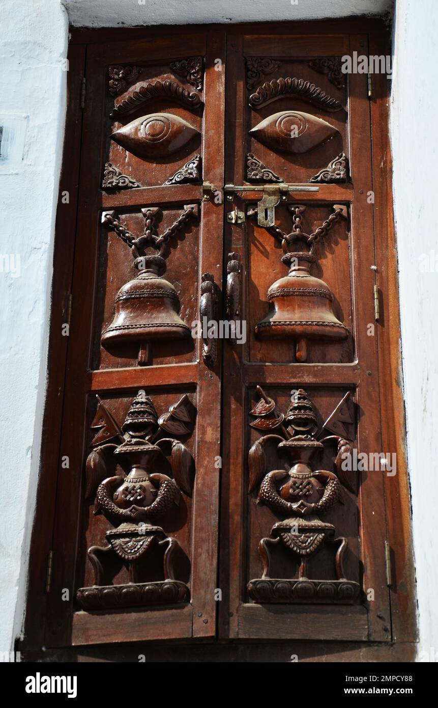 Carving art wooden eyes of wisdom buddha on antique wood door in ...