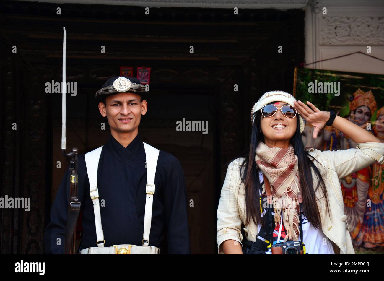 Traveler thai women journey and travel visit portrait posing with security guard nepalese people ...